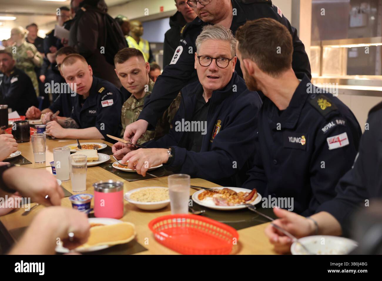 Britain's Prime Minister Keir Starmer has breakfast in the junior ...
