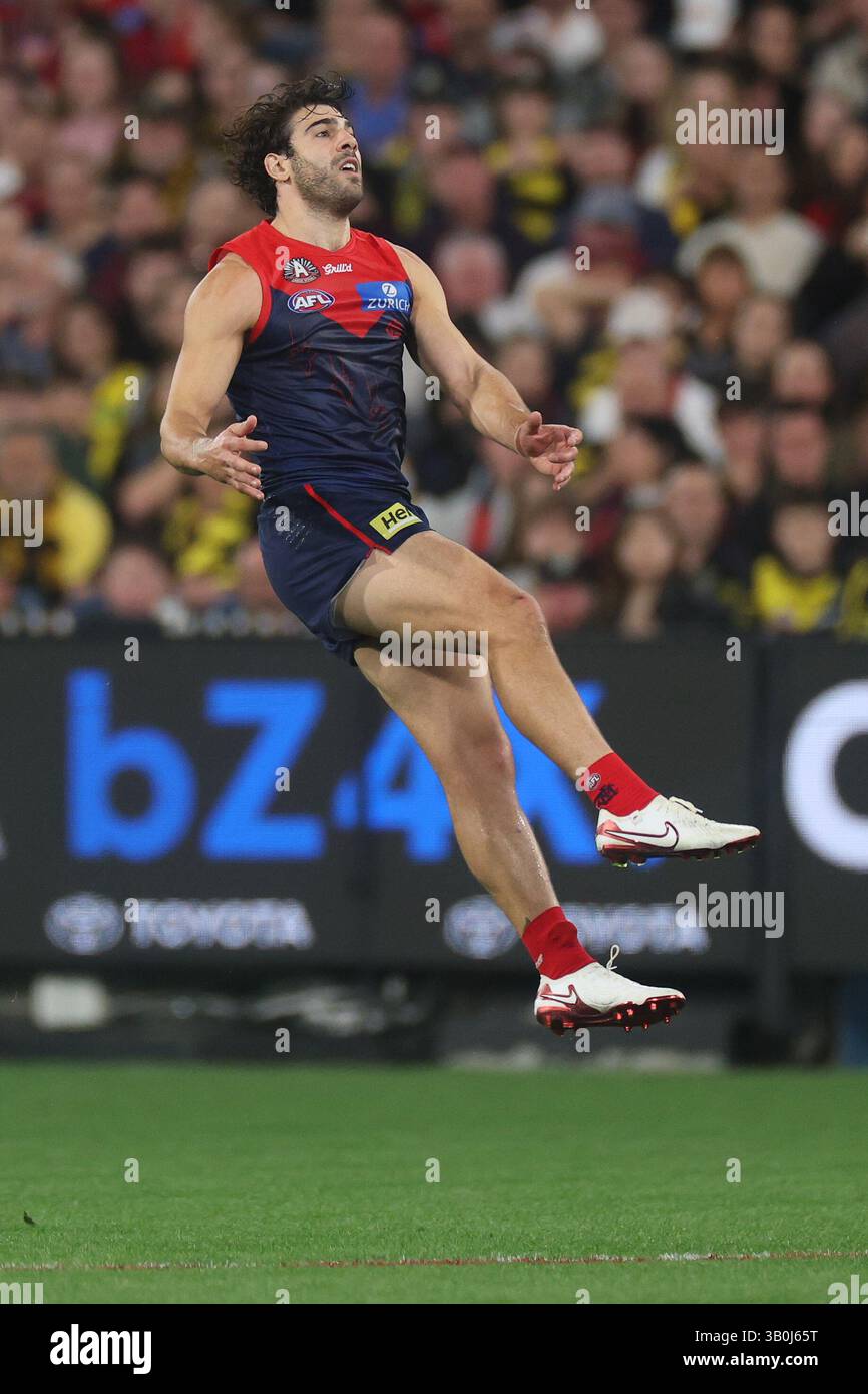 Christian Petracca of the Demons kicks a goal during the AFL Round 7 ...