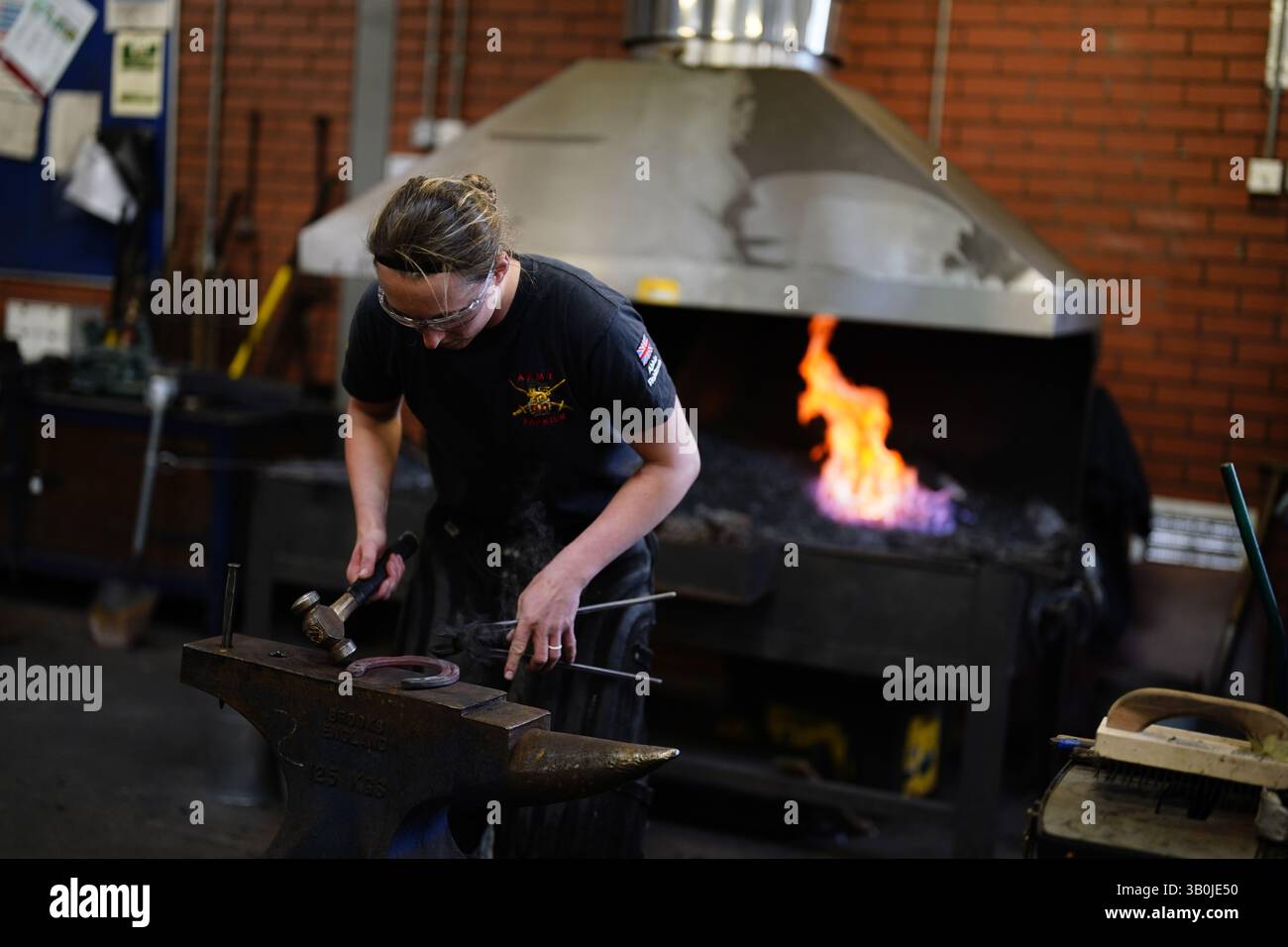 A horseshoe is made in the forge as members of The King's Troop, Royal ...