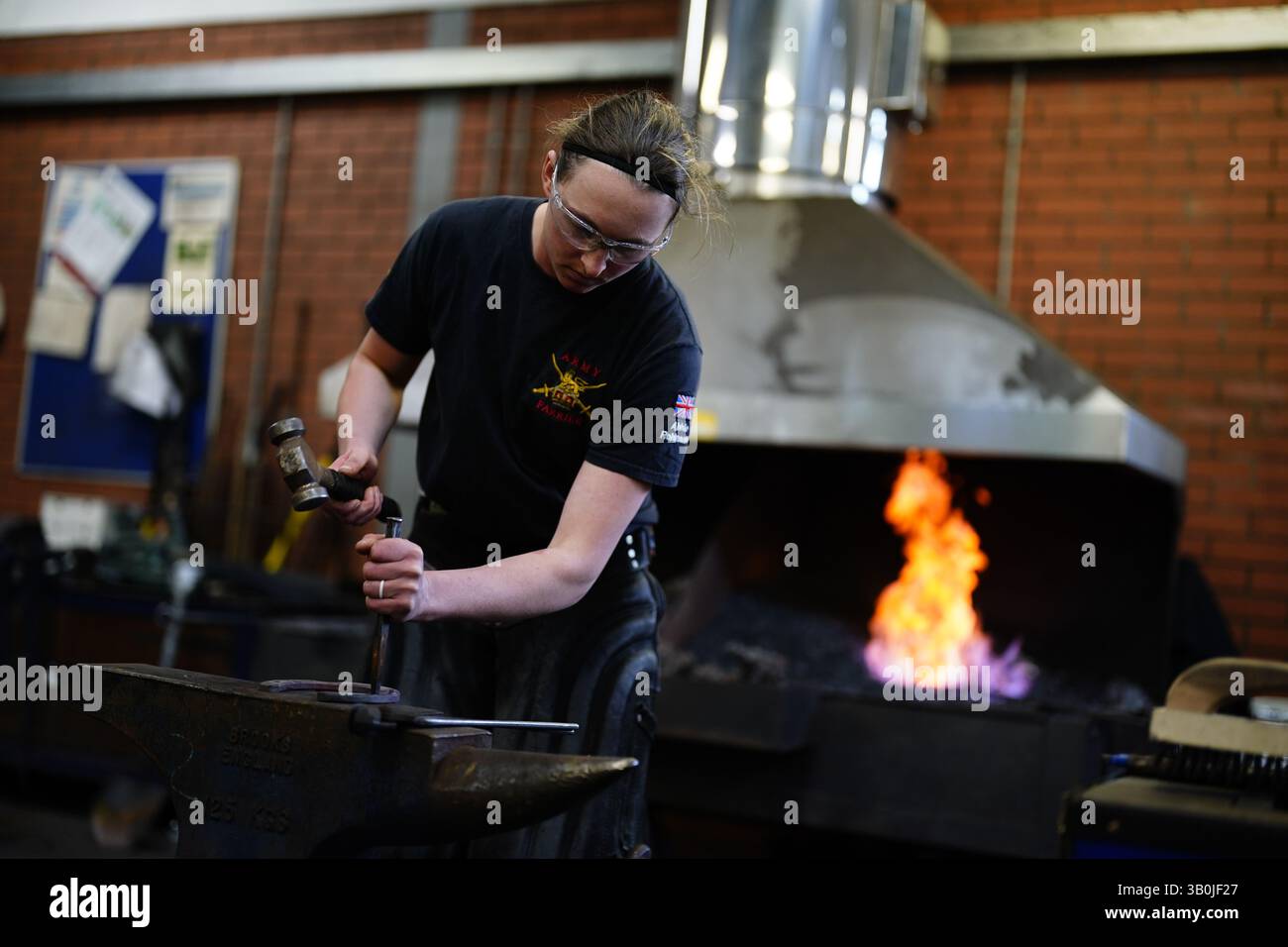 A horseshoe is made in the forge as members of The King's Troop, Royal ...