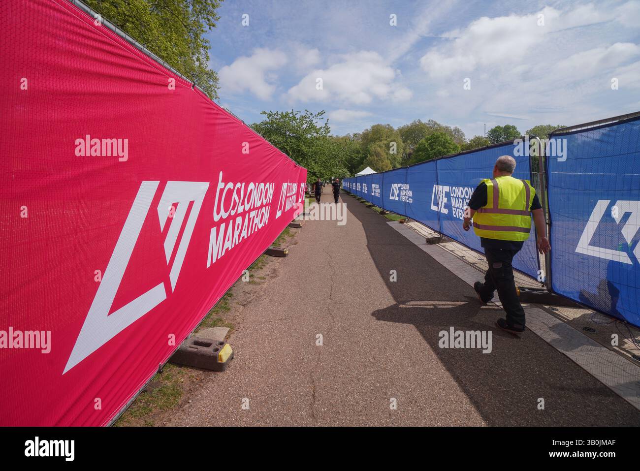 London UK 24 April 2025. Hoardings are displayed along The Mall for the ...