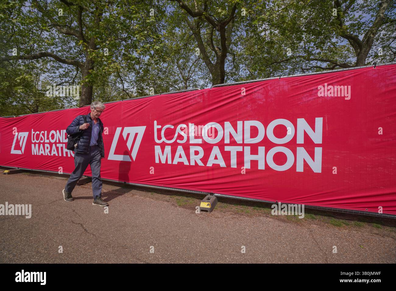 London UK 24 April 2025. Hoardings are displayed along The Mall for the ...