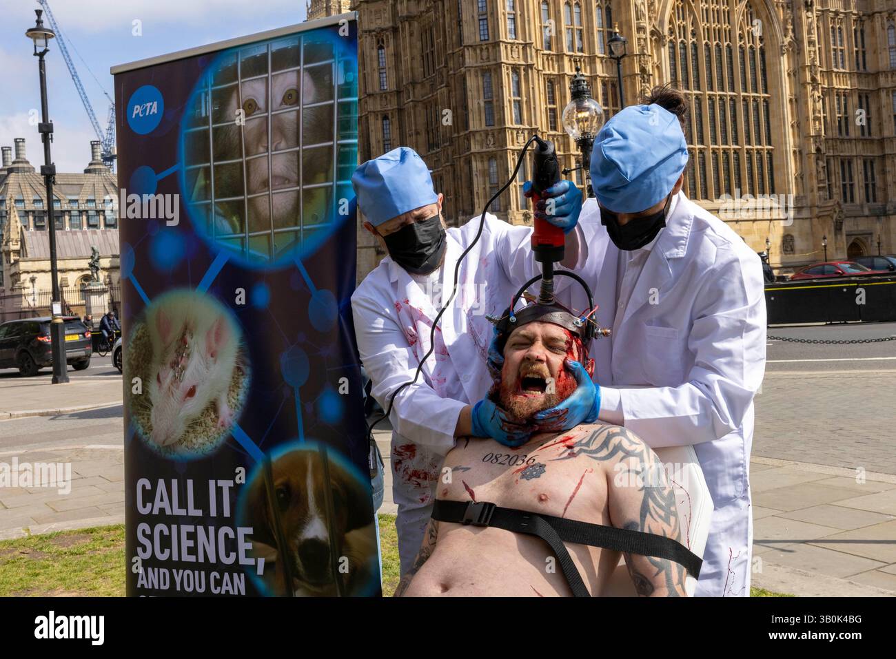 London, UK. 24th Apr, 2025. PETA activists stage a gruesome protest ...