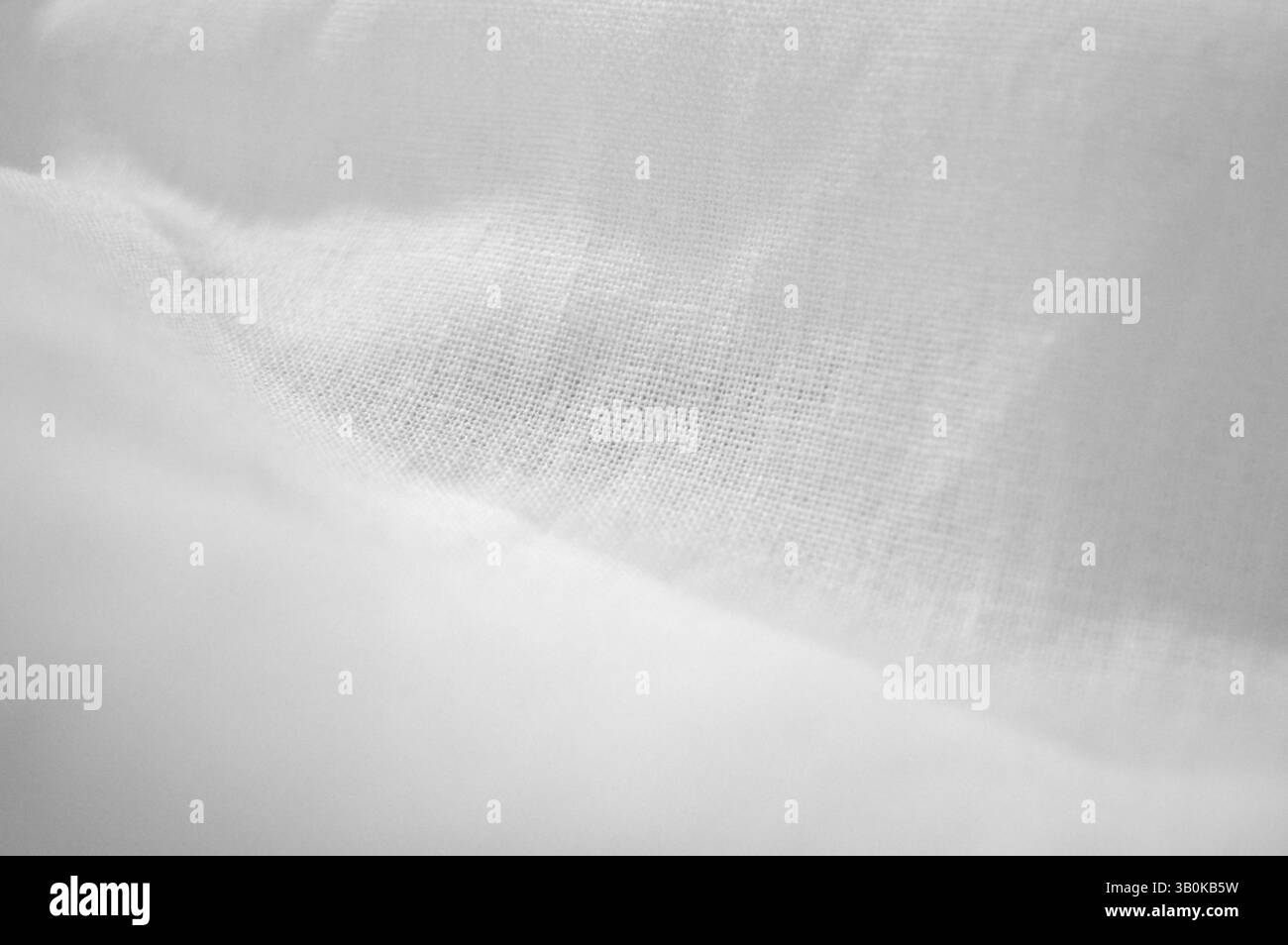 Soft white fabric with a subtle, elegant texture; perfect for ...