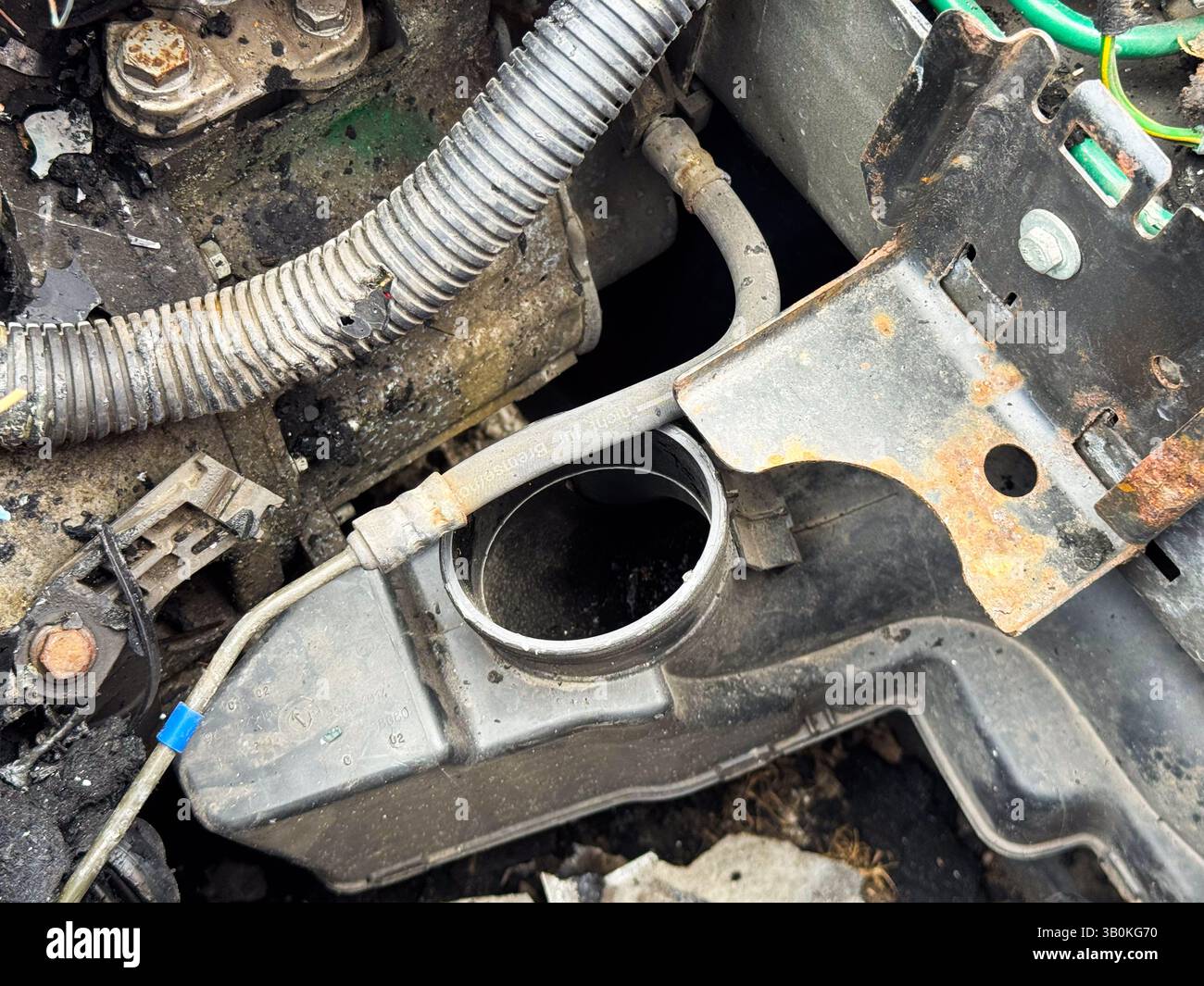 Car radiator neck and mounting bracket showing exposed coolant inlet ...