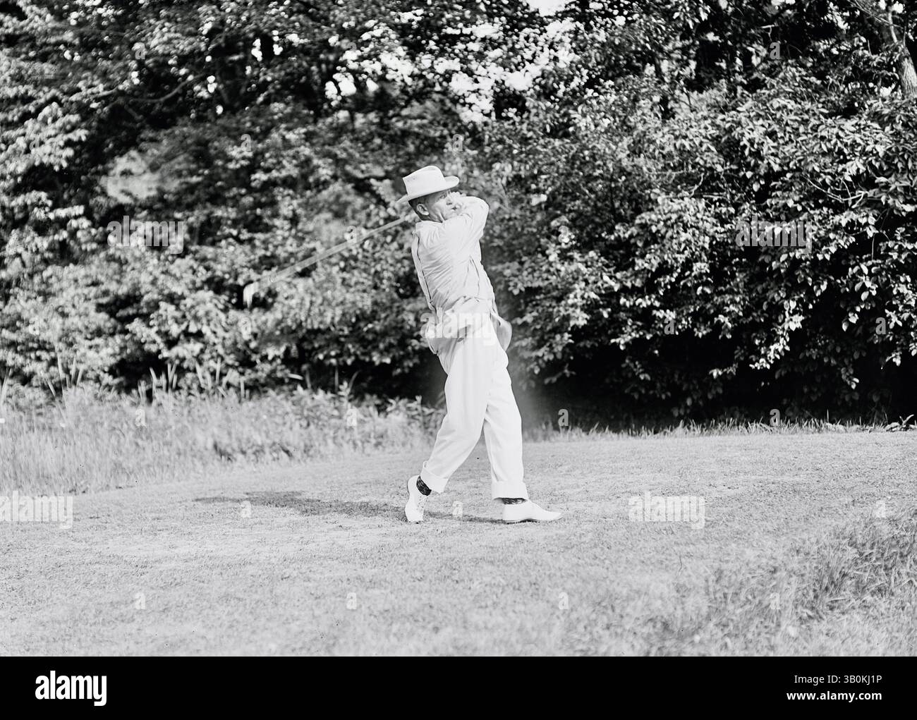 Walter J. Travis, Australian/American amateur golfer, playing golf ...