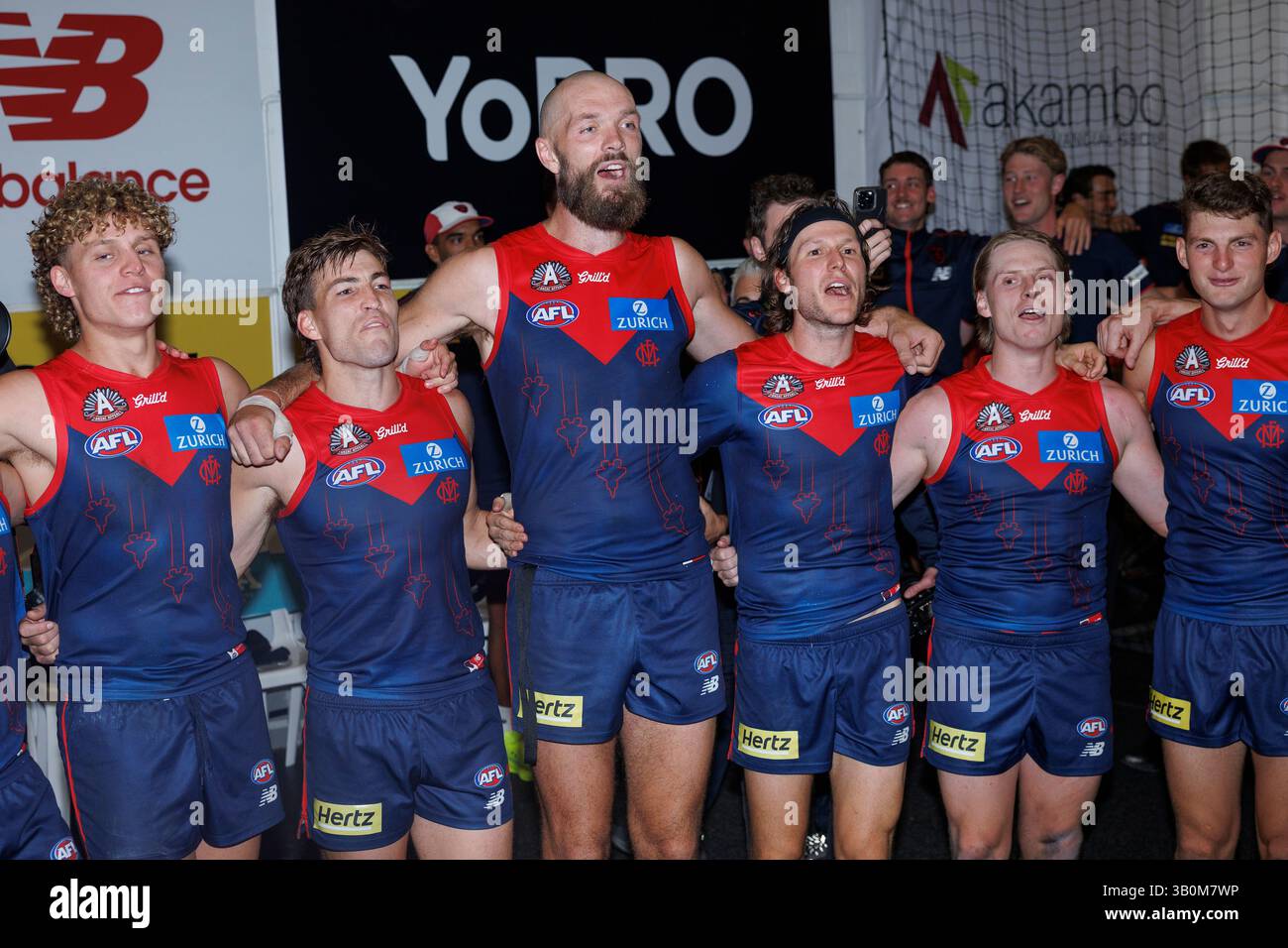 Melbourne, Australia. 24th Apr, 2025. The Demons sing the team song ...