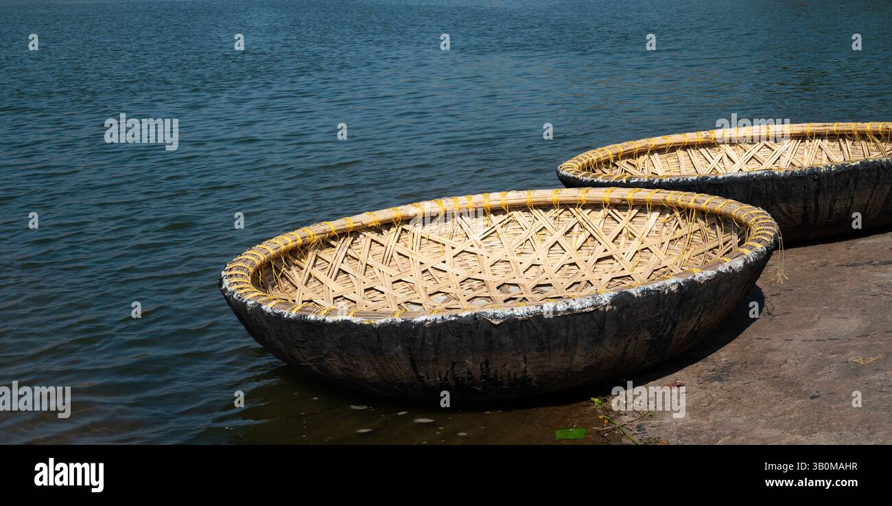 Coracle boats at the Tungabhadra River in Hampi, India, traditional ...