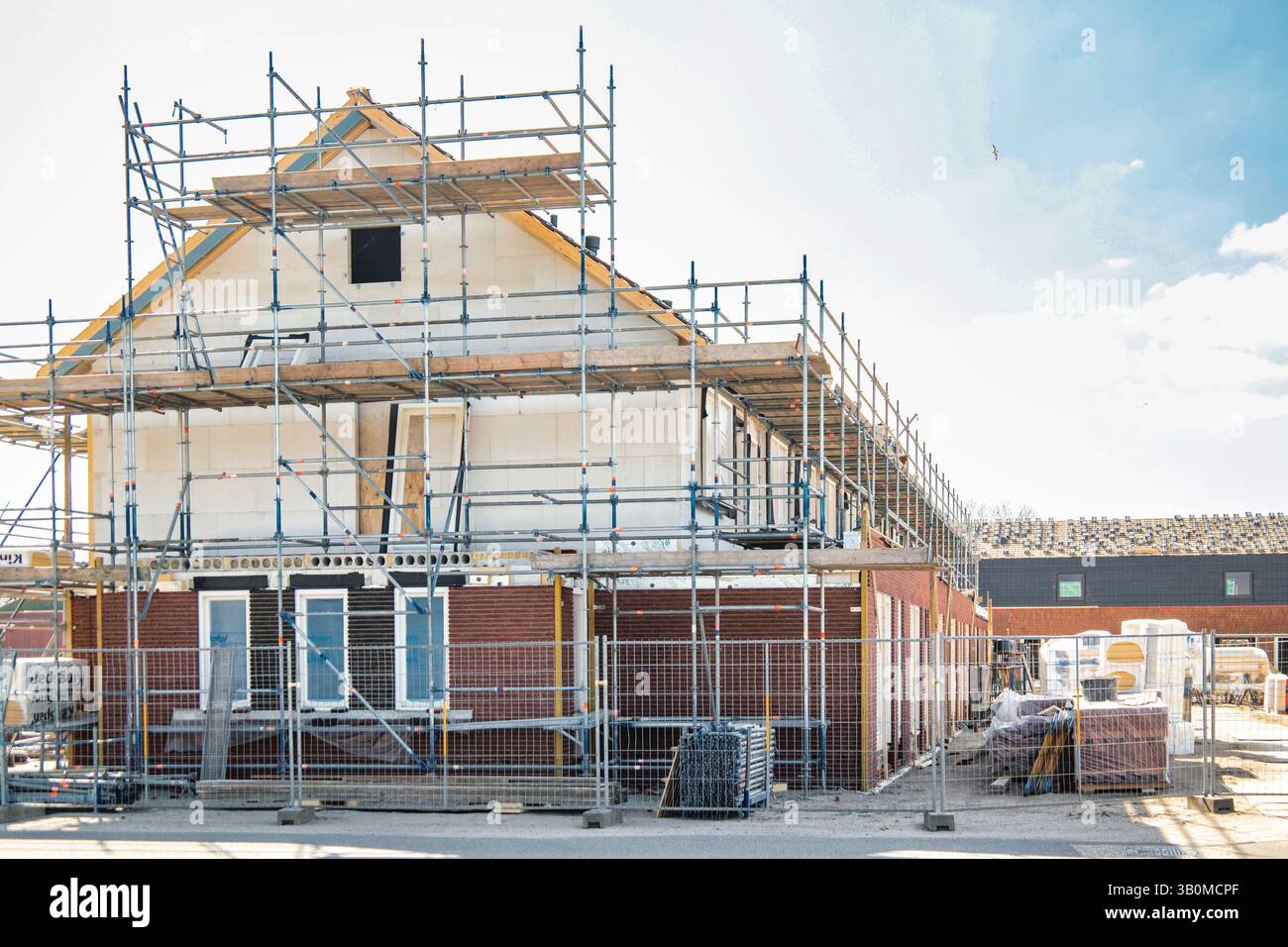 an empty construction site of a family house in the Netherlands, a ...
