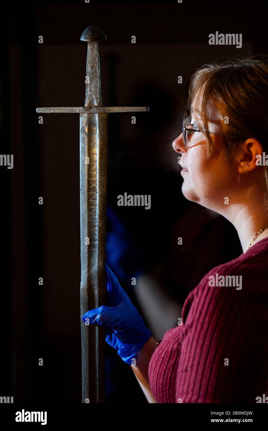Exhibitions assistant Niamh Finlay takes a closer look at an 11th Century iron sword, typical of ...