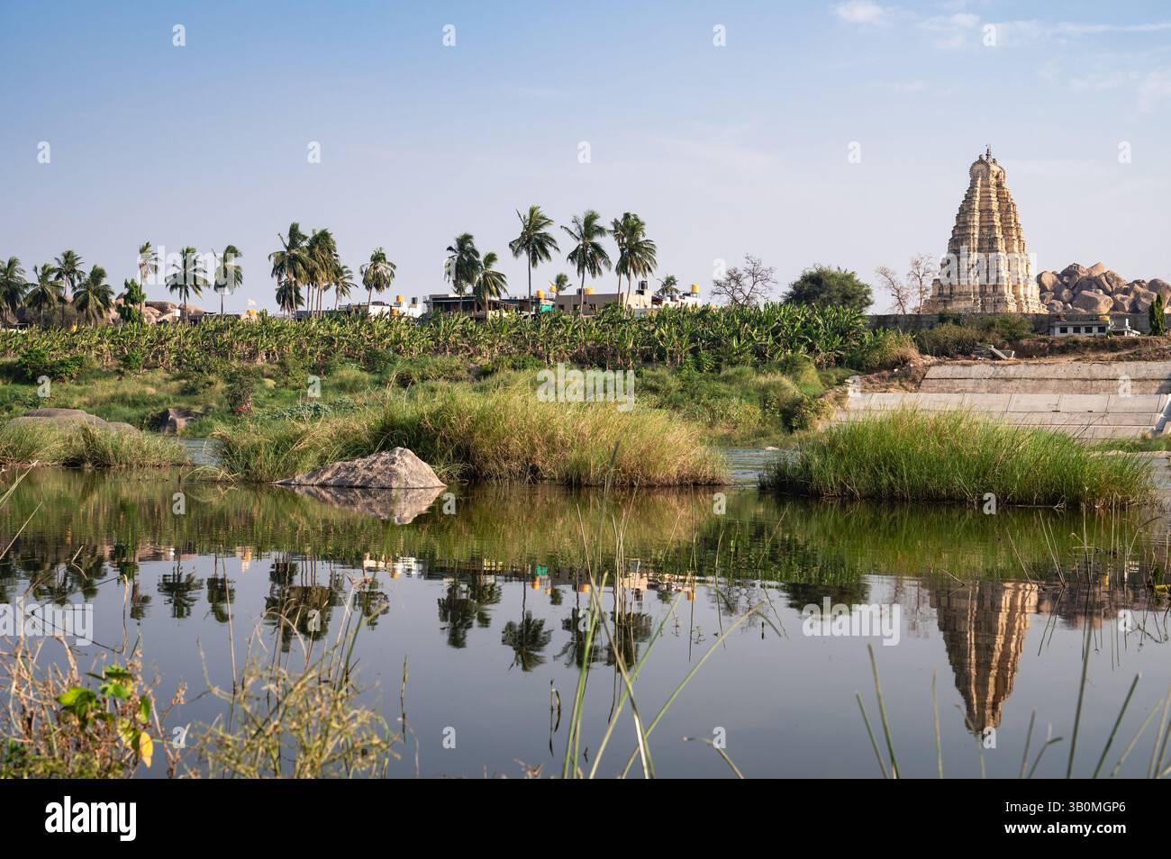 Tungabhadra river with view over the historic city of Hampi with the ...