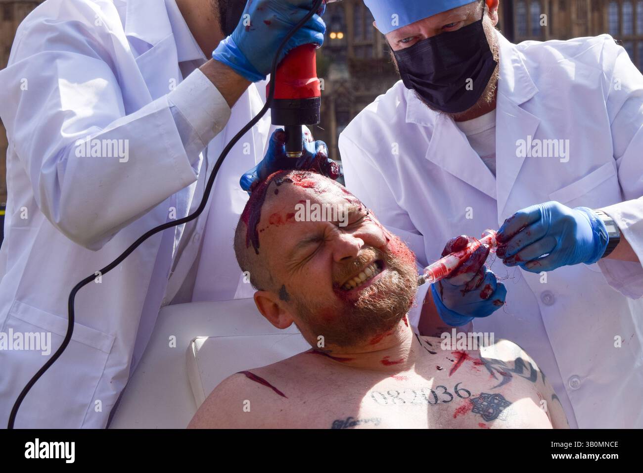 PETA (People for the Ethical Treatment of Animals) activists wearing ...