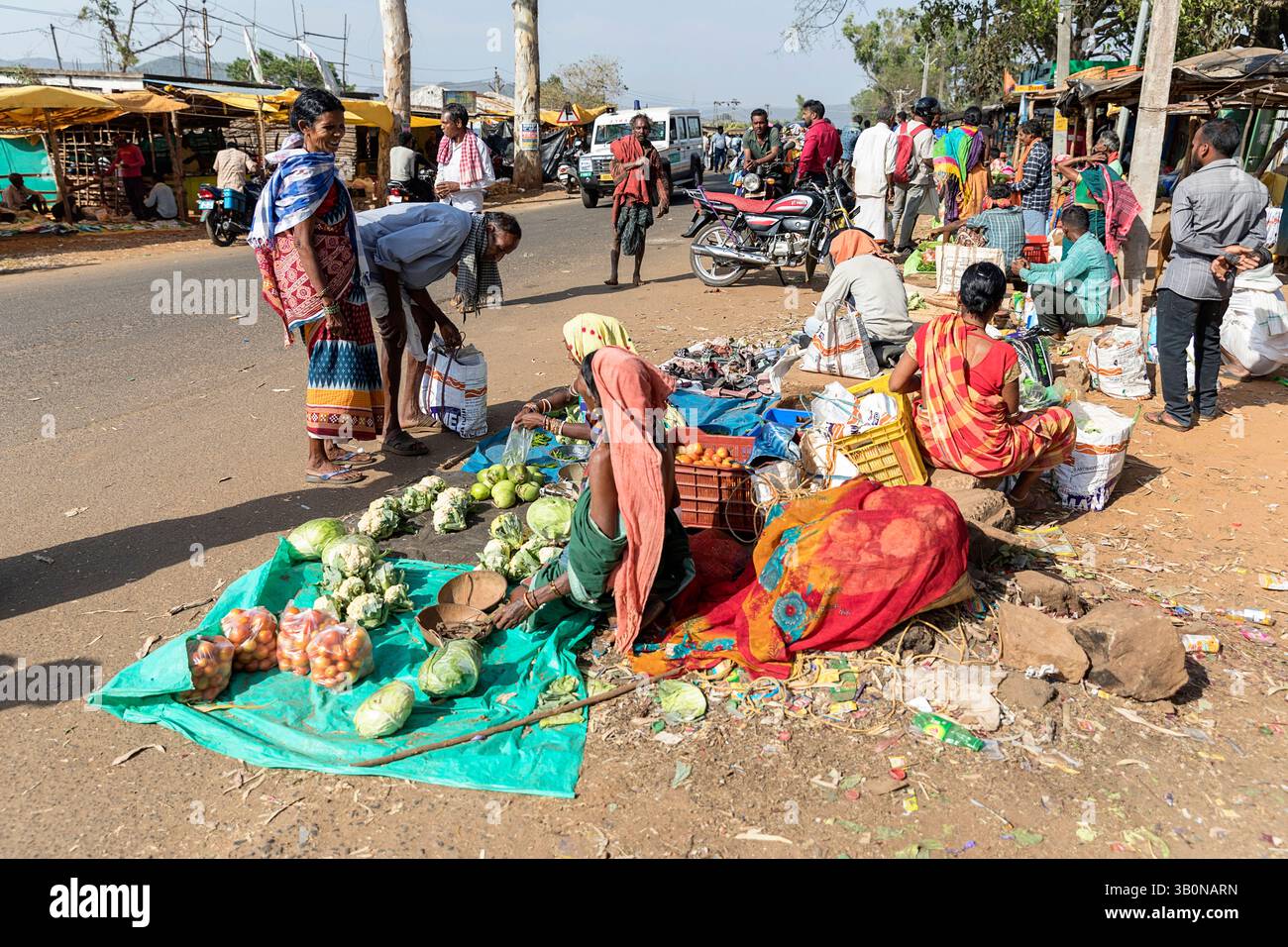 Weekly Local village market, people selling fruits and vegetables from ...