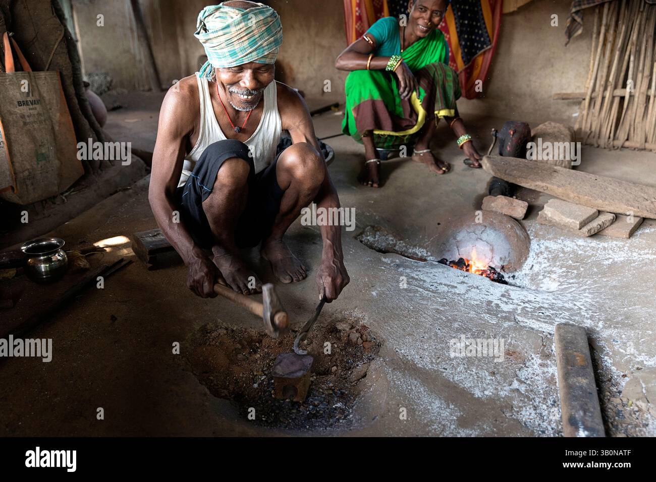 Local blacksmith working in a small workshop in a village in rural part ...
