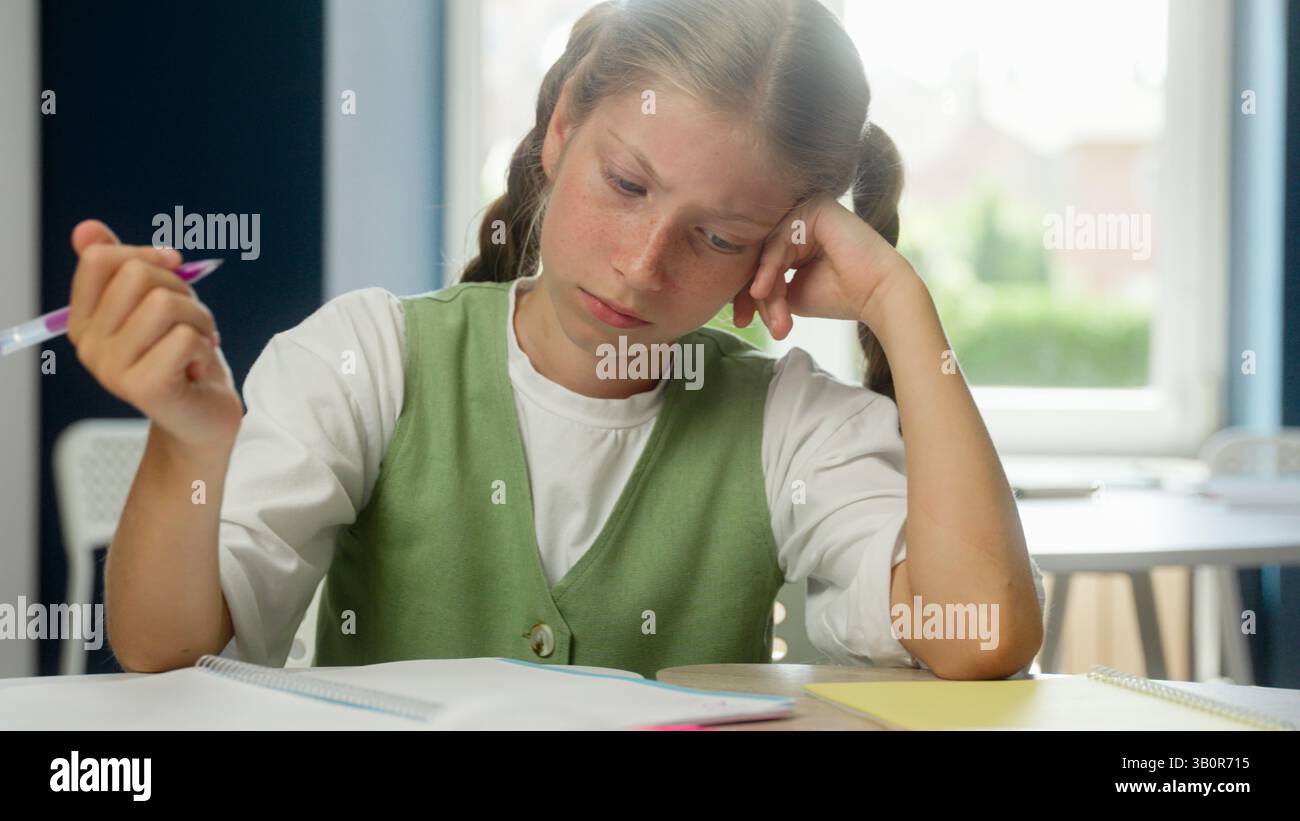 Child writing classroom sad hi-res stock photography and images - Alamy