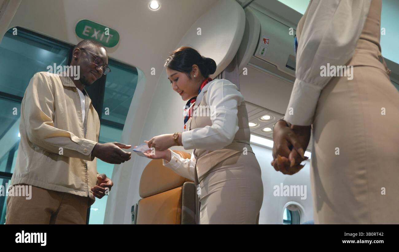 Asian flight attendants greeting hi-res stock photography and images ...