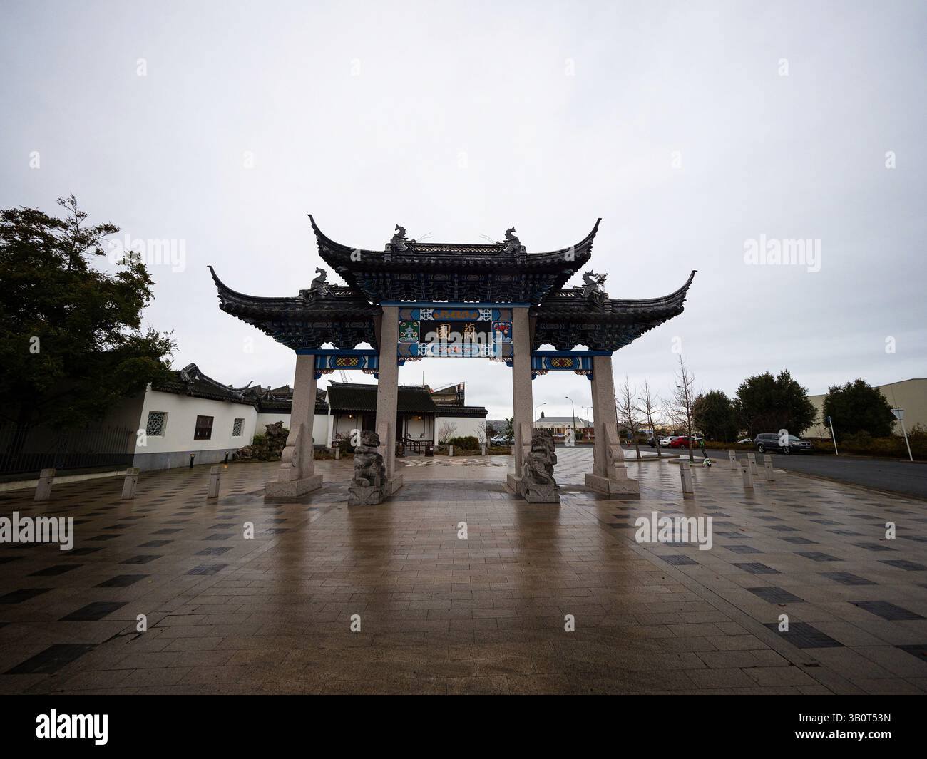 Traditional stone arch gate, typical asian architecture at Dunedin ...