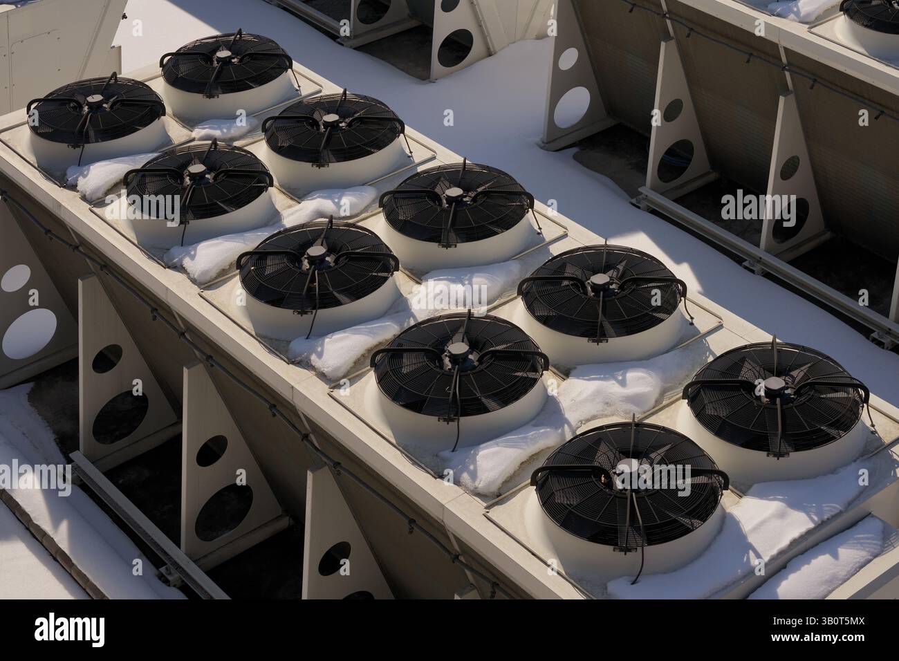 Refrigeration chillers installed in a row. Cooling system Stock Photo ...