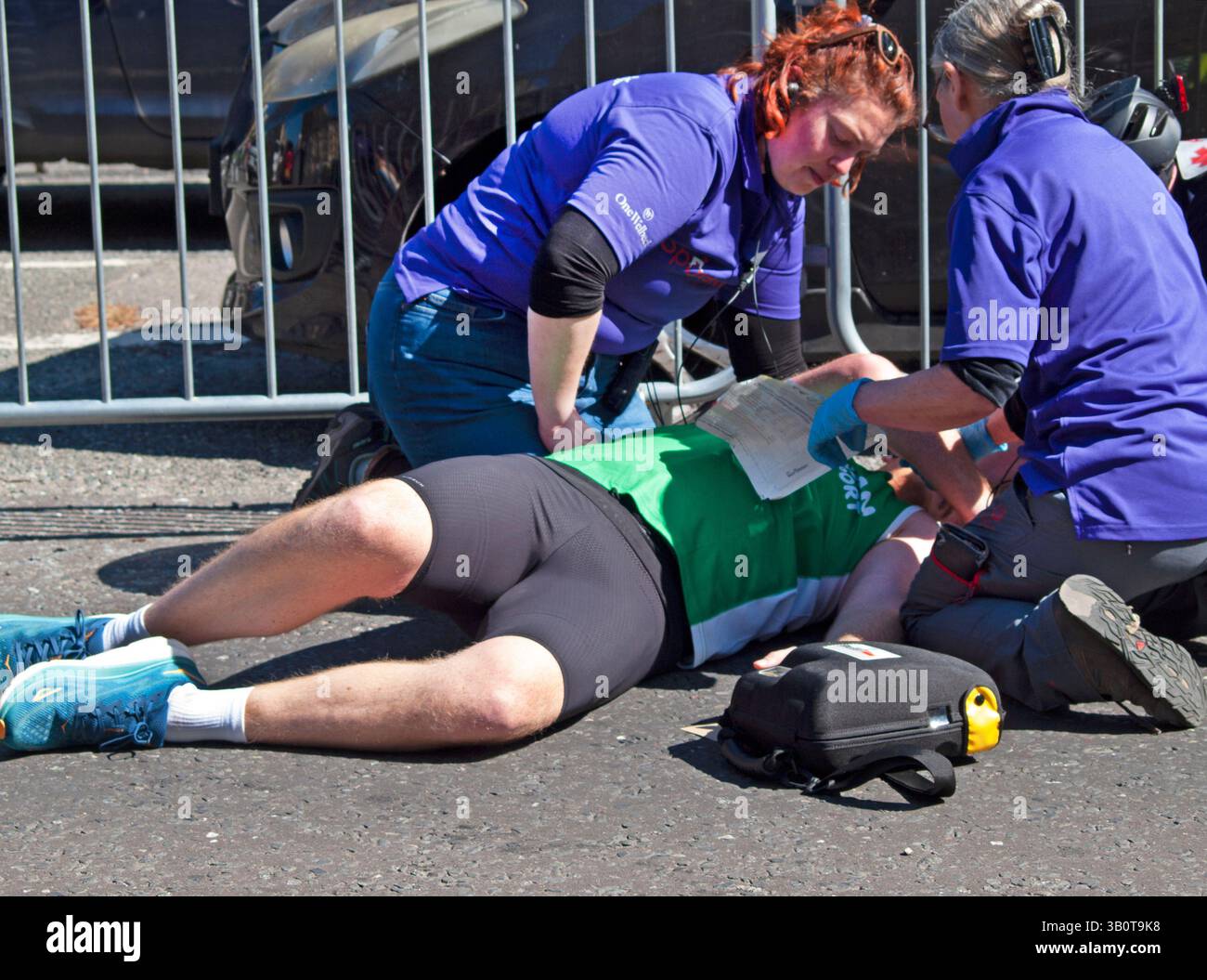 A runner collapses at the Brighton Marathon 2025 Stock Photo - Alamy