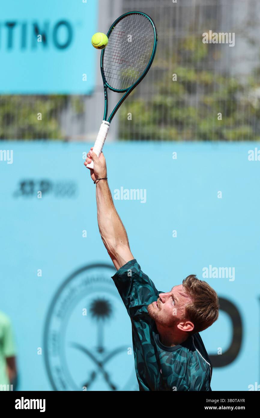 David Goffin of Belgium in action against Alexandre Muller of France ...