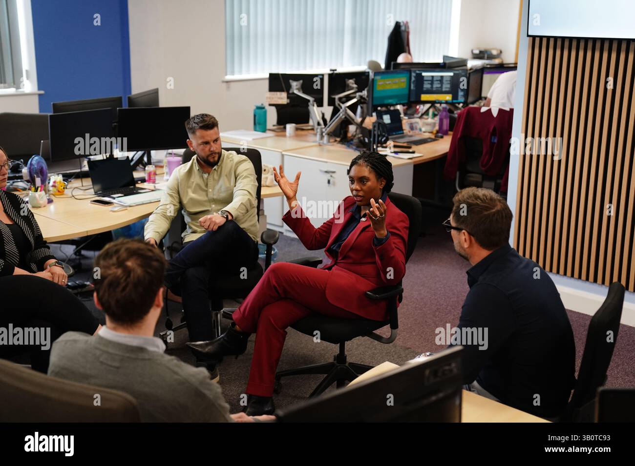 Conservative party leader Kemi Badenoch speaking to staff during a visit to Exel Technology in ...