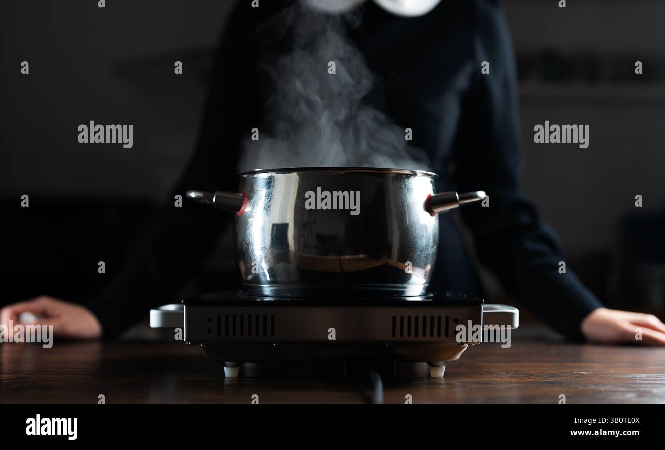 Cooking steam rising from pot hi-res stock photography and images - Alamy