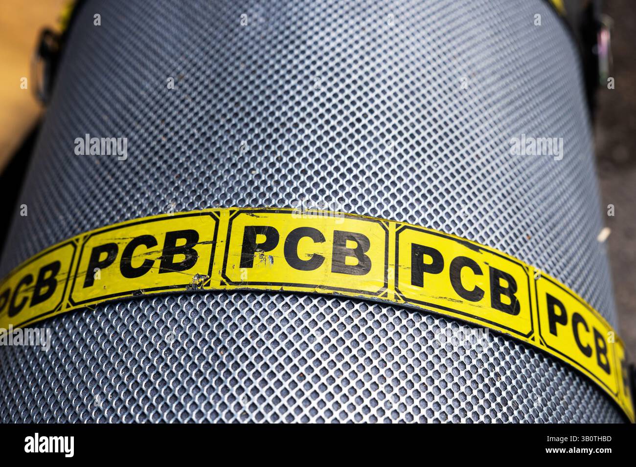 A construction site, sign stating that PCB decontaminate is in progress ...