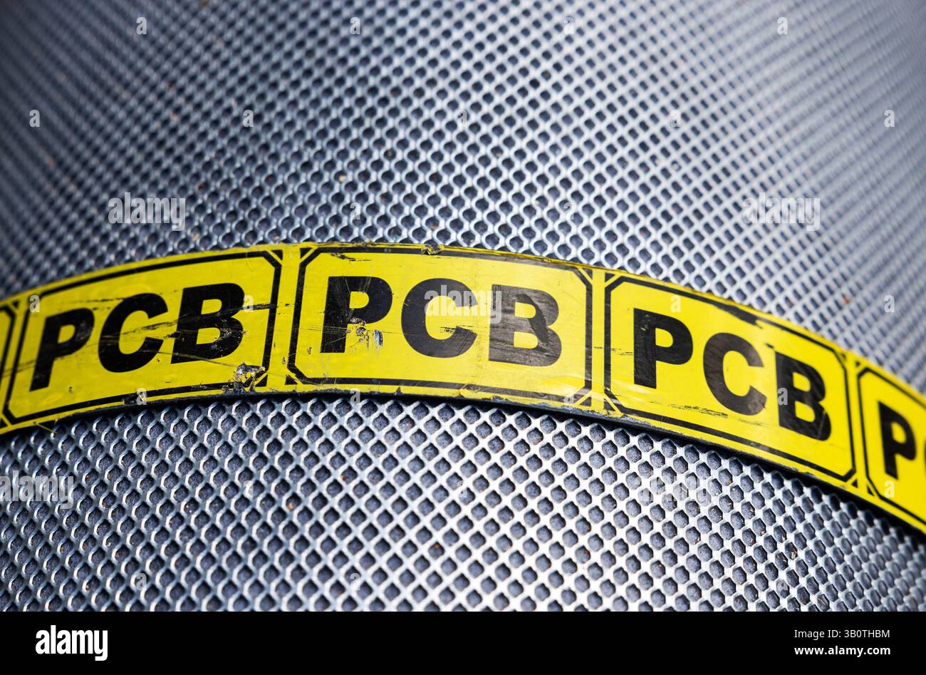 A construction site, sign stating that PCB decontaminate is in progress ...