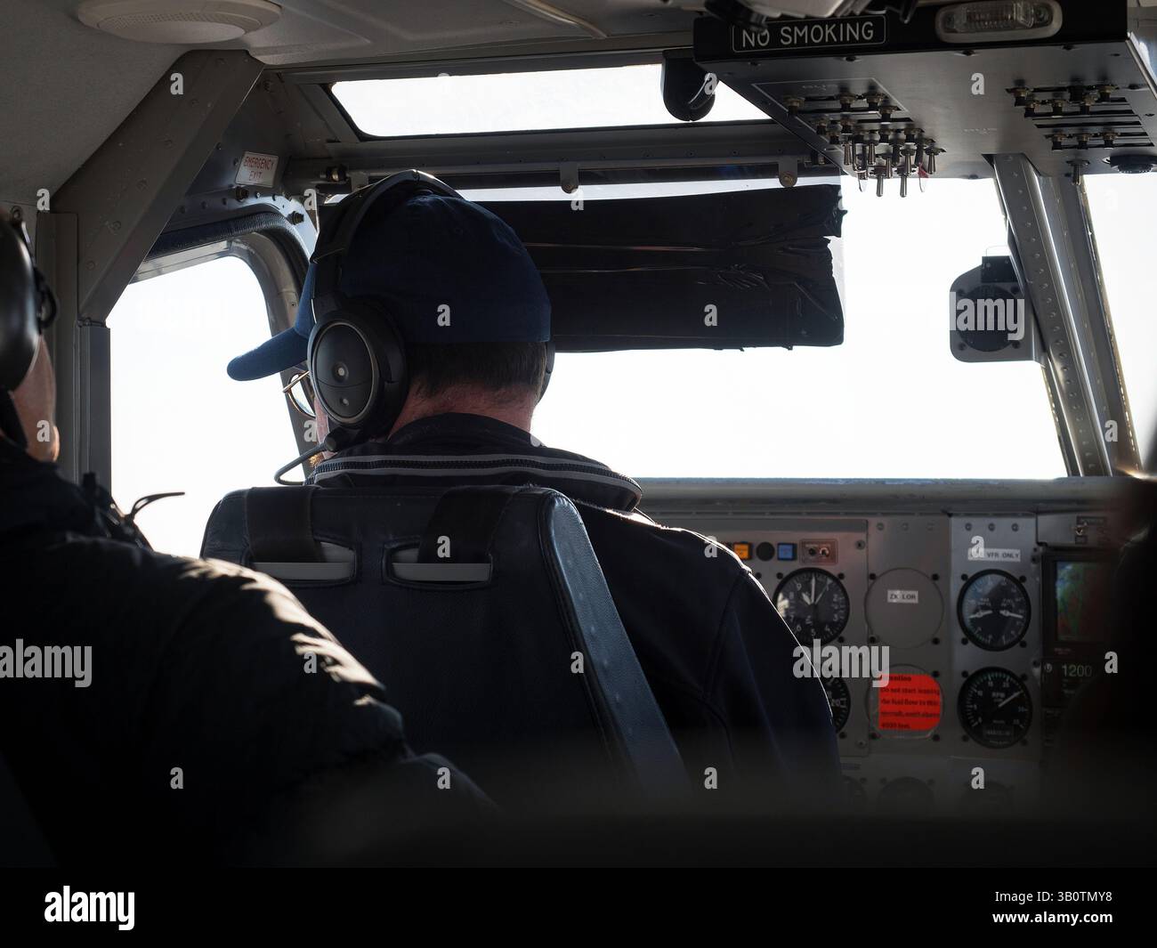 GippsAero GA8 Airvan propeller aircraft pilot looking out the window ...