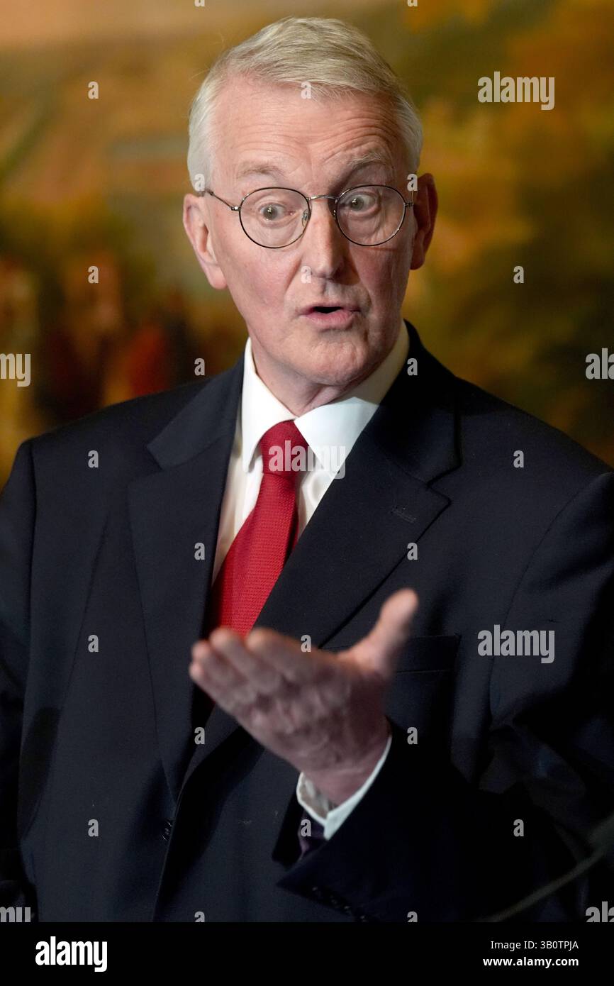 Secretary of State for Northern Ireland Hilary Benn speaks to media ...
