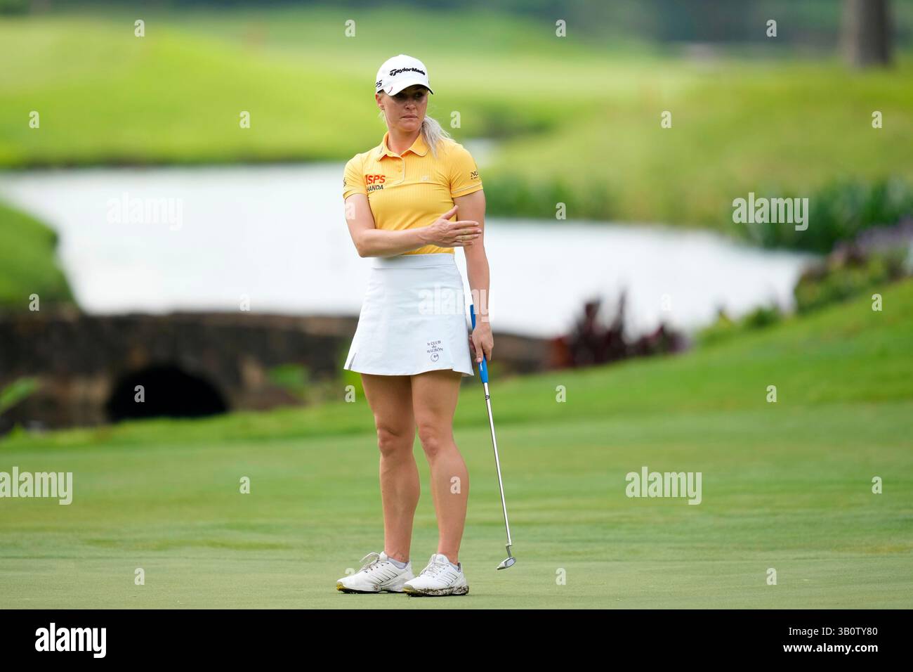 Charley Hull, of England, reacts after a putt on the 15th hole during ...