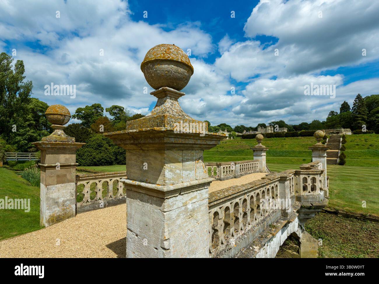 Ornamental stone bridge in Easton Walled gardens on a sunny Spring day ...