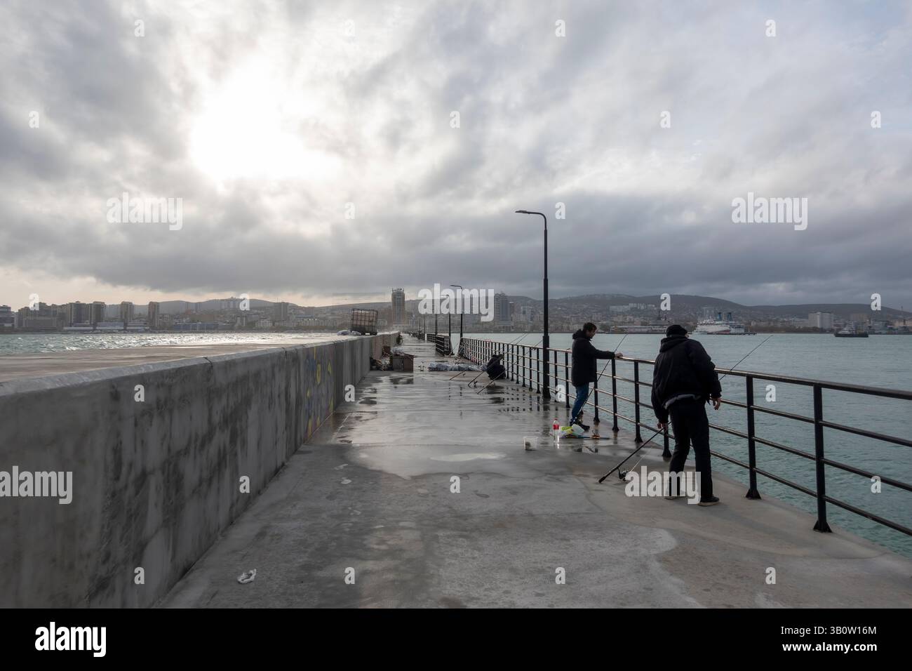 Novorossiysk, Russia - 18 August 2024 Many fishermen catch mullet fish ...