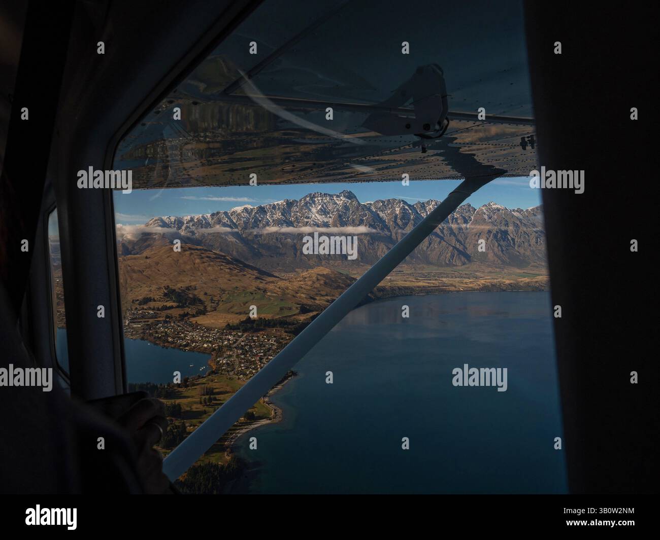Airplane window seat panorama view of Lake Wakatipu and The Remarkables ...
