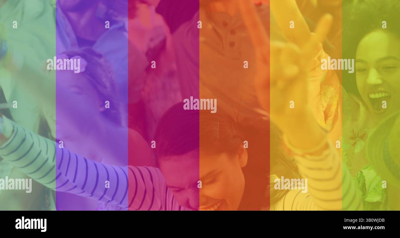 Image of rainbow over group of happy people Stock Photo - Alamy