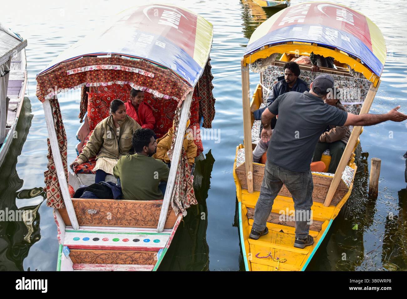 April 24, 2025, Srinagar, India: Indian tourists enjoy boat ride across the world famous Dal ...