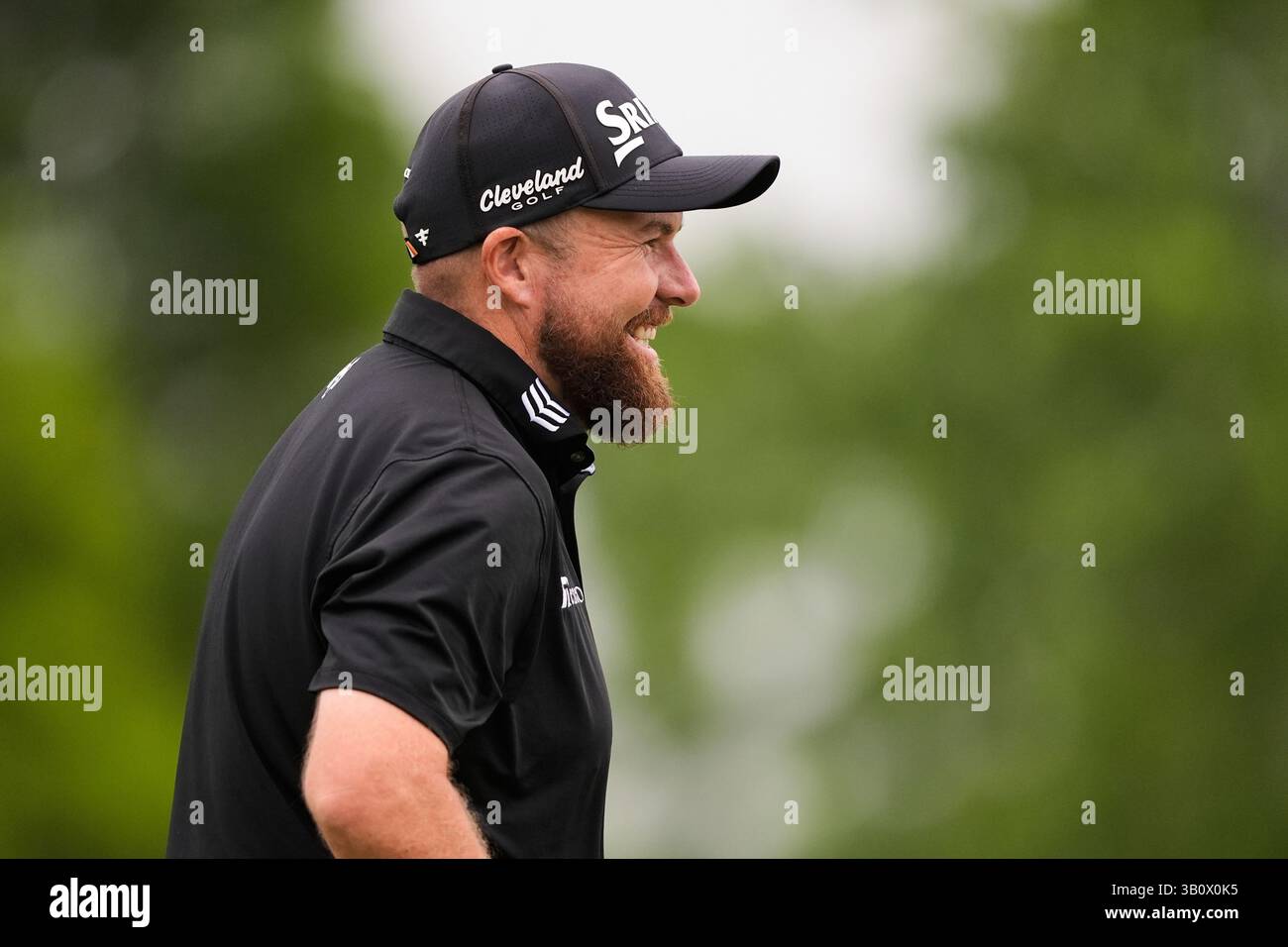 Shane Lowry, of Ireland, reacts after making birdie on the 11th hole ...