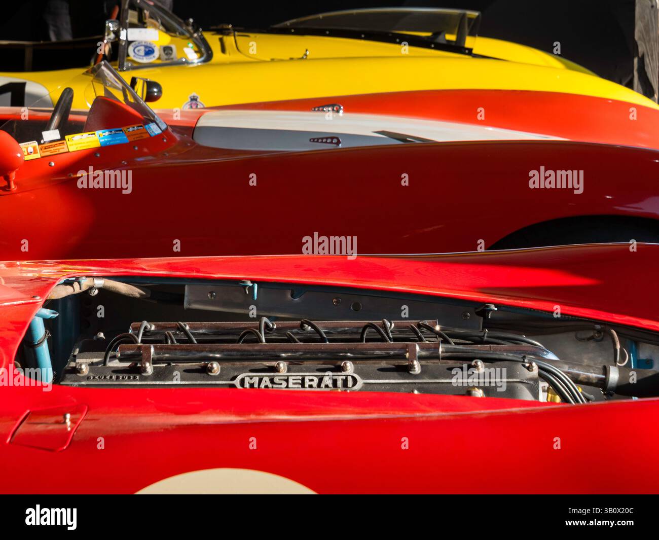 A display of colourful racing cars in the paddock at the 82 Members Meeting, Goodwood Motor ...