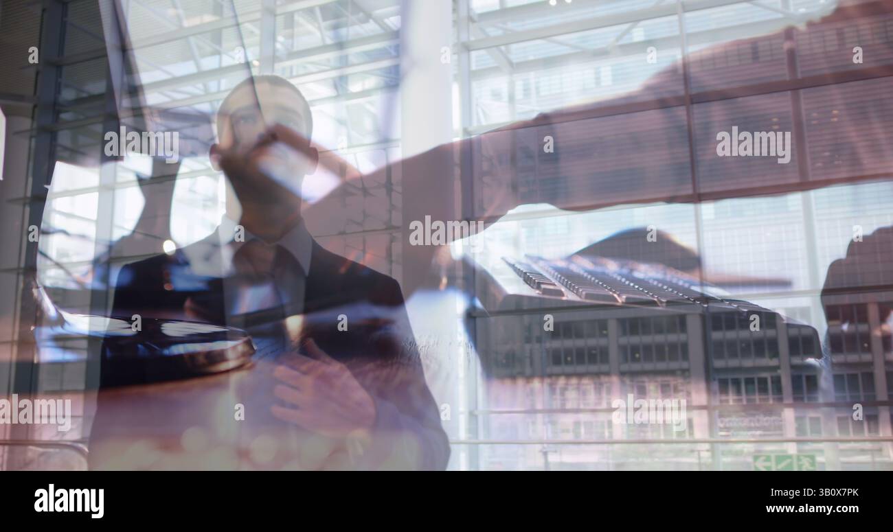 Image of men using computer over businessmen Stock Photo - Alamy