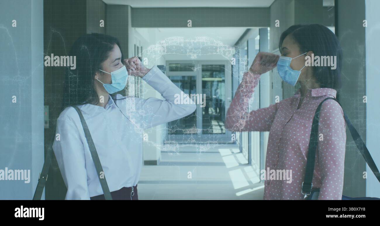 Image of spinning human brain over businesswomen wearing face masks ...