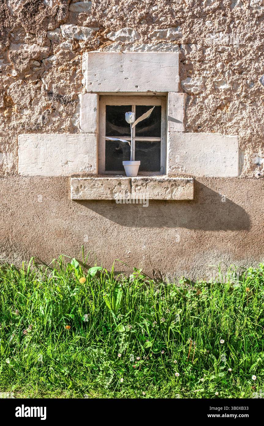 Small window using large limestone block construction with false white ...