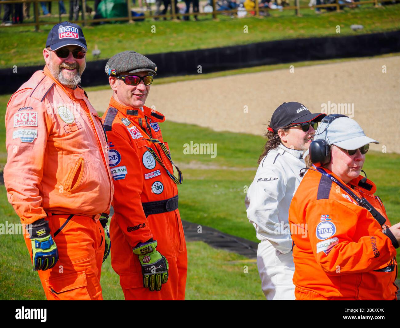A group of male and female marshals at the 82 Members Meeting, Goodwood ...