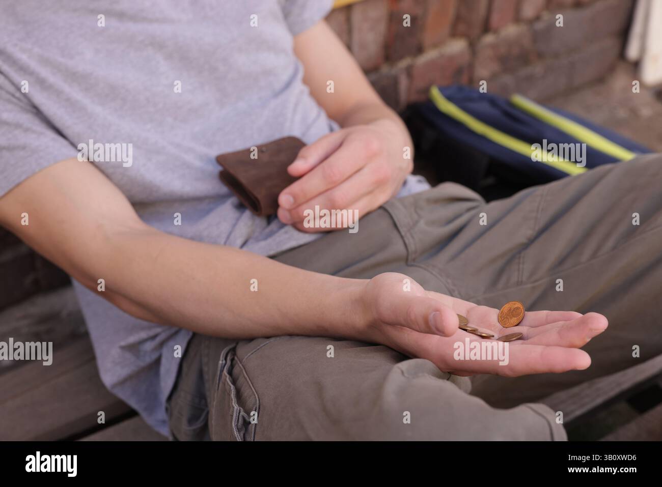 Homeless man with coins asking money outdoors, closeup Stock Photo - Alamy