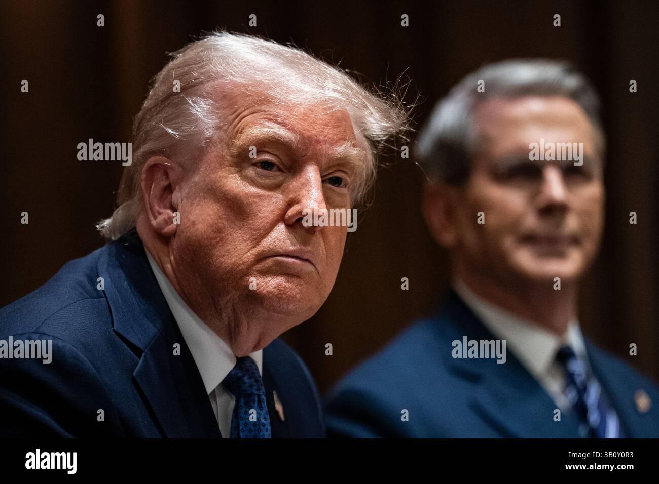 Washington, USA. 24th Apr, 2025. US President Donald Trump, left, and ...