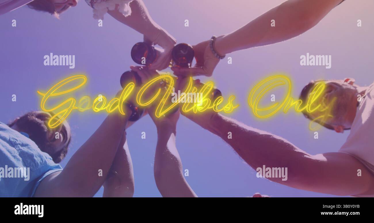 Image of good vibes only over hands of diverse male friends toasting ...