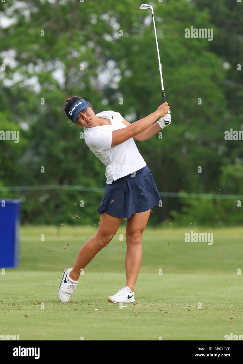 THE WOODLANDS, TX - APRIL 24: Jasmine Koo (USA) (a) watches her tee ...