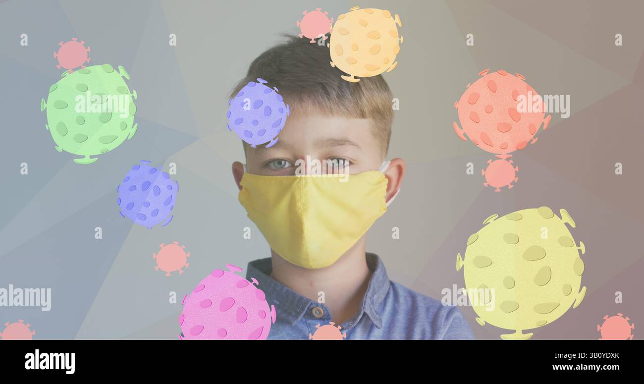 Standing boy wearing yellow mask against abstract polygon wall, with ...