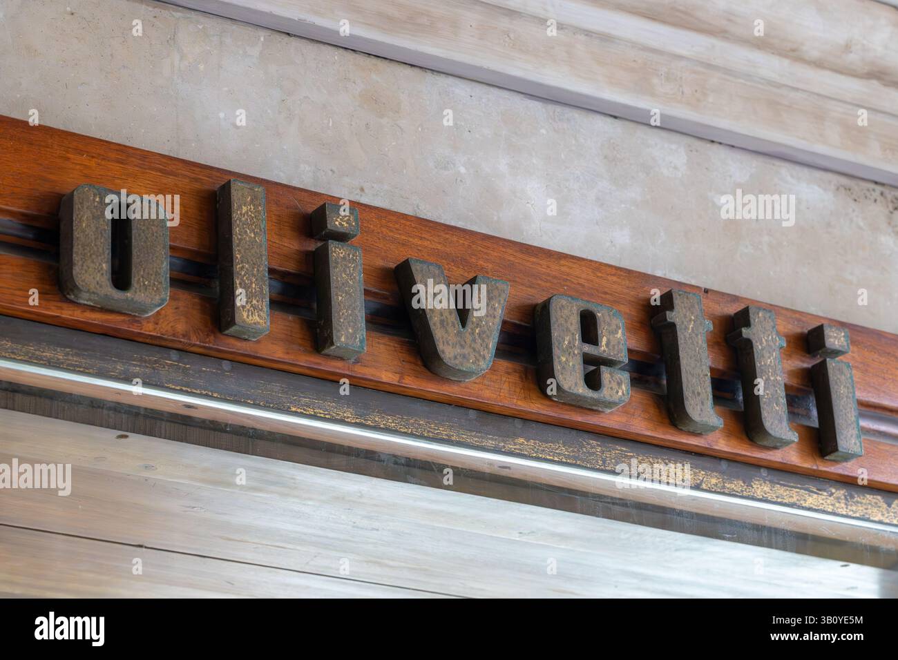 Venice, Italy - April 17 2025: Vintage Olivetti museum sign on facade of historic Venetian ...