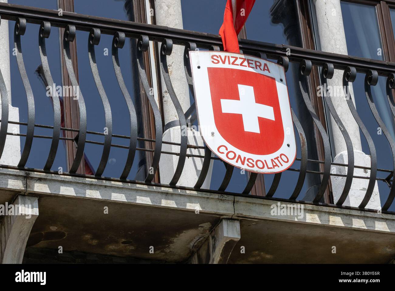 Venice, Italy - April 17 2025: Swiss Consulate crest mounted on balcony ...