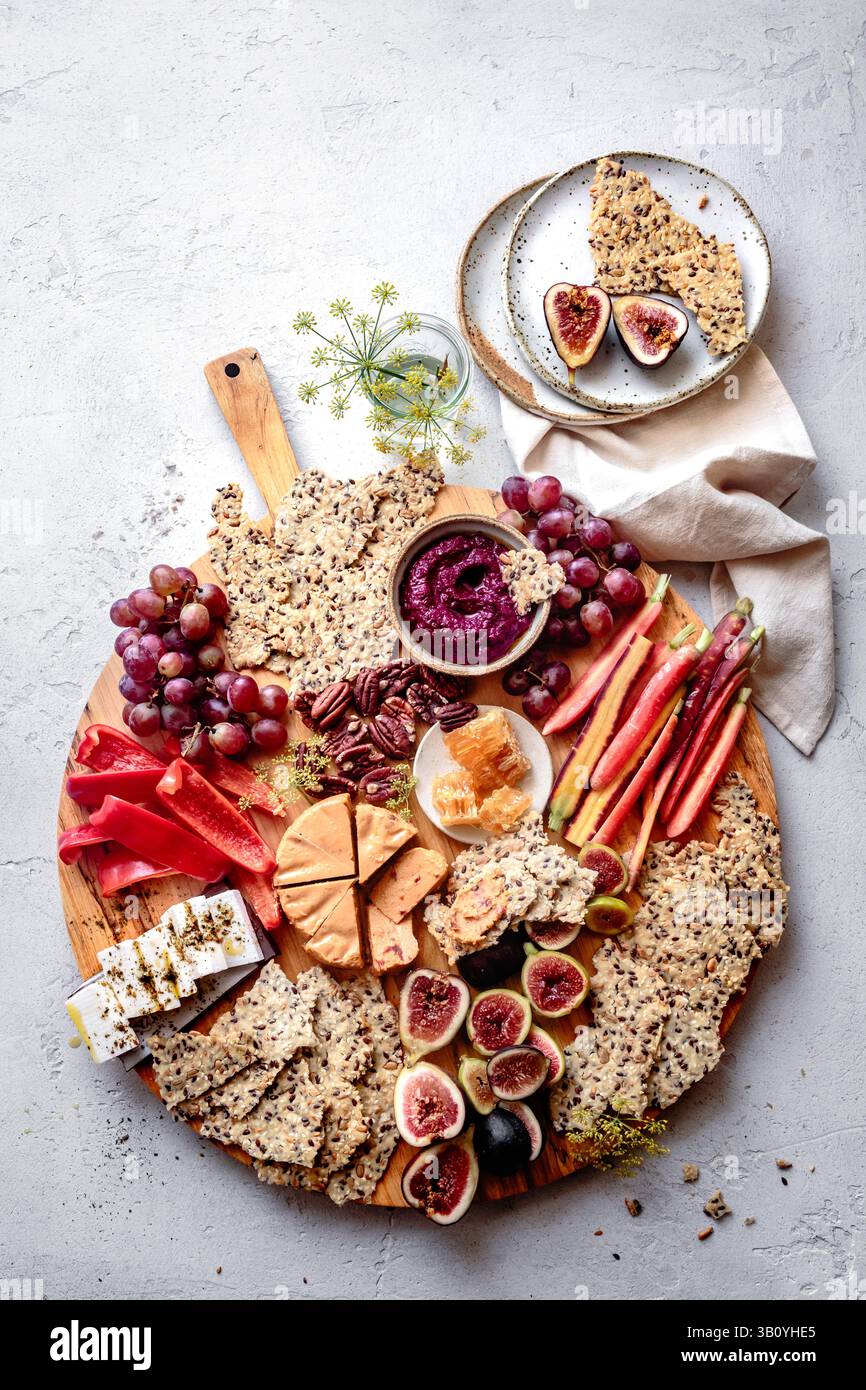 Vegan fall harvest cheese board Stock Photo - Alamy